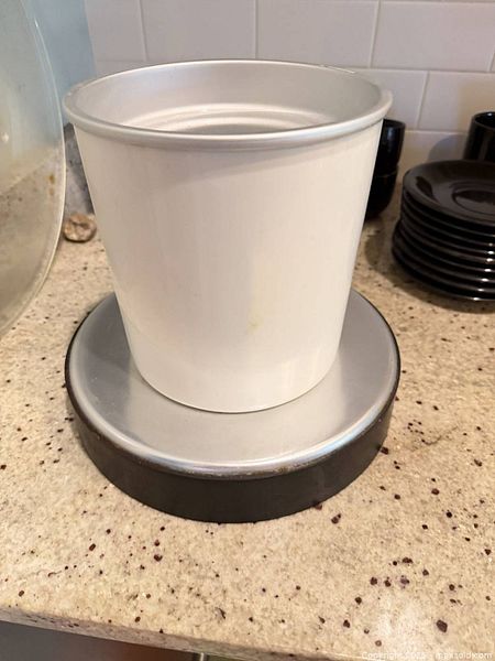 White stamped metal canisters with base | Maxsold