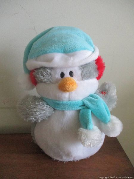 New Cuddle Barn Animated Christmas Plush | Maxsold