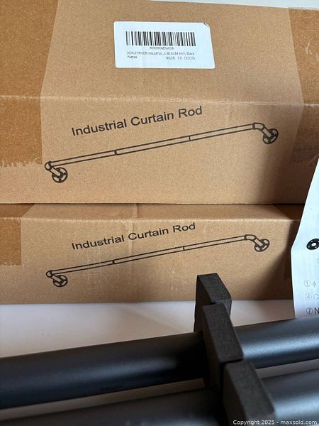 2 adjustable industrial curtain rods | Maxsold