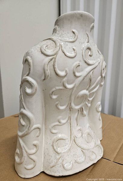 Off-white glazed ceramic torso jacket vase | Maxsold