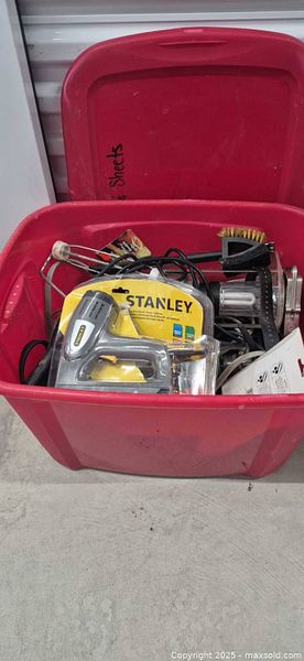 Corded drill, Stanley electric staple gun and assorted hand tools | Maxsold