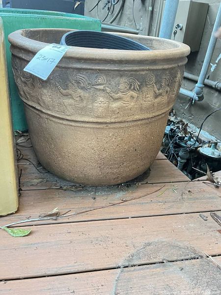 Terracotta planter 23 in diameter x 17 in height | Maxsold