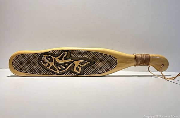 Indigenous carved wooden club | Maxsold