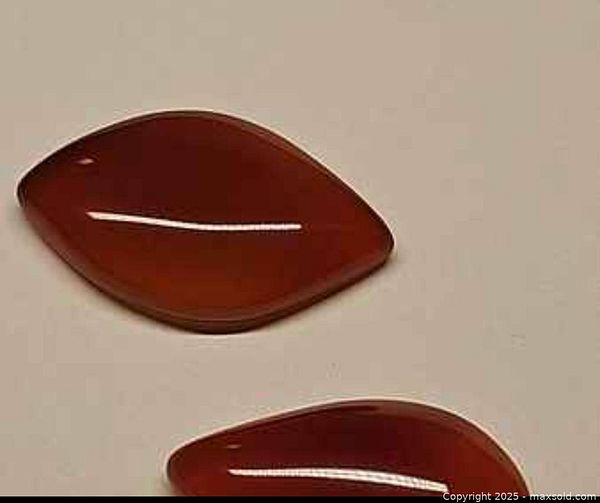 40.13ct natural deep orange-red carnelian pair | Maxsold