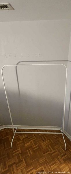 IKEA white freestanding garment rack | Maxsold