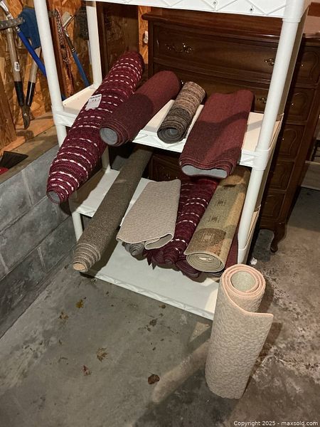 Collection of small rugs and shower rack | Maxsold