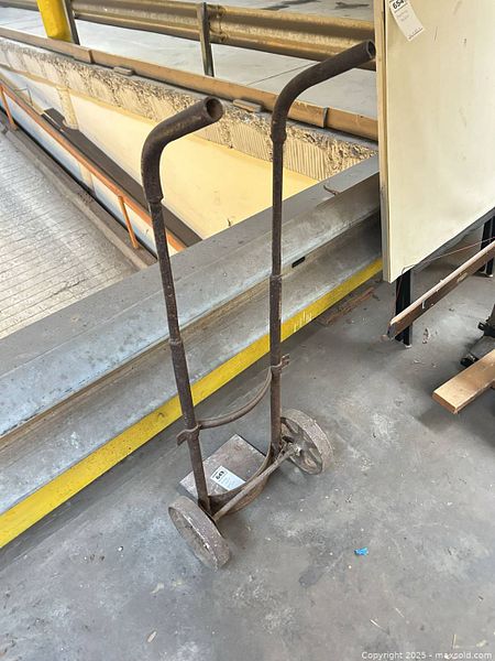 Antique cast-iron two-wheel hand truck | Maxsold
