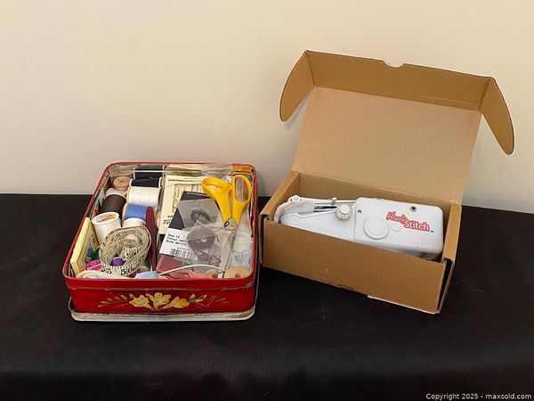 Handy Stitch handheld sewing machine with red metal sewing tin packed ...