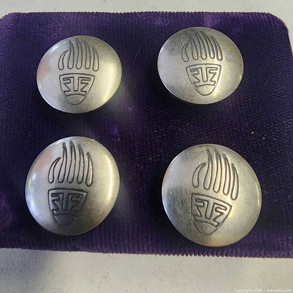 4 metal claw-design button covers | Maxsold