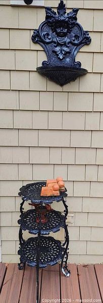 Victorian cast iron plant stand and wall cherub birdbath | Maxsold