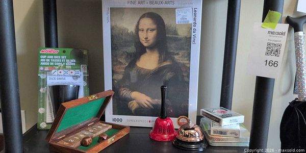 Sealed Mona Lisa puzzle, sealed cards, dice cup, two bells | Maxsold