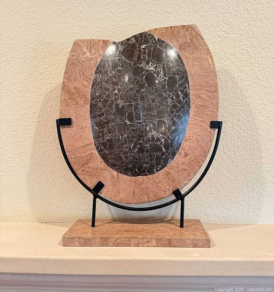 Two-tone marble display plate on metal stand | Maxsold