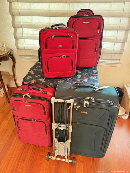 4 rolling suitcases with folding luggage dolly | Maxsold