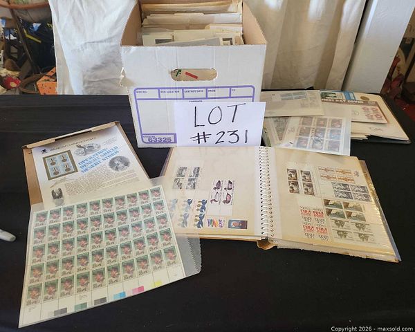 Box lot USPS mint postage sheets and album pages | Maxsold