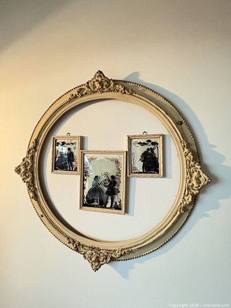 Ornate round wall frame with 3 reverse-glass silhouette pictures | Maxsold