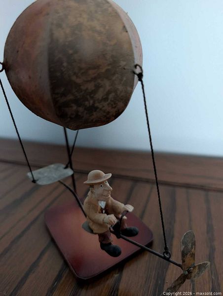 Folk art steampunk aviator sculpture | Maxsold