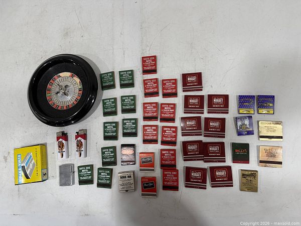 Roulette wheel, advertising matchbooks, metal cigarette case | Maxsold