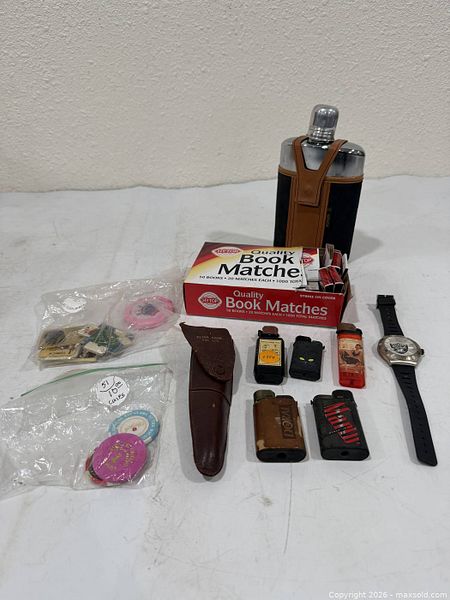Vintage pocket lighters, flask, Raiders watch, matches, accessories ...