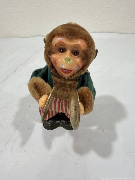 Vintage wind-up cymbal monkey toy | Maxsold