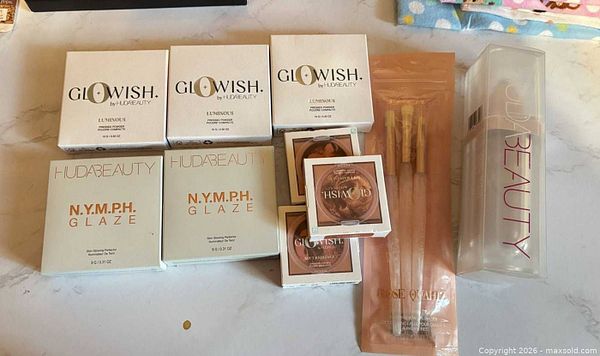 Huda Beauty Glowish powders, bronzers, N.Y.M.P.H. highlighters, brush ...