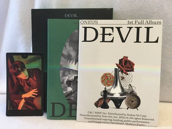 ONEUS “Devil” album package, CD, books, postcards | Maxsold