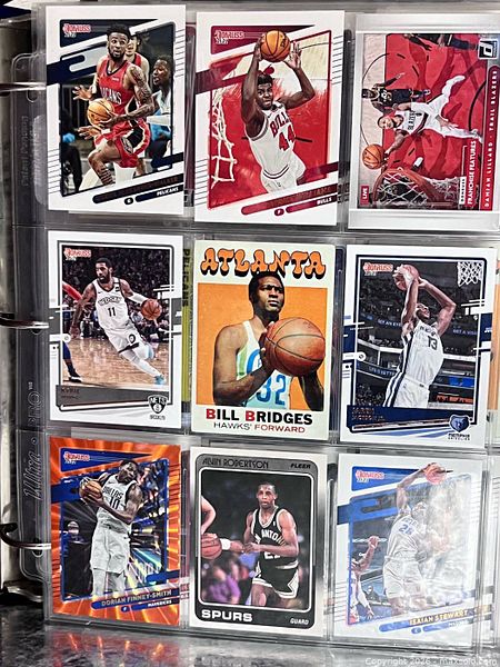 Basketball card binder with Michael Jordan | Maxsold
