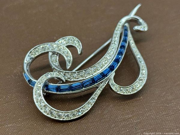 Vintage Boucher blue rhinestone brooch | Maxsold
