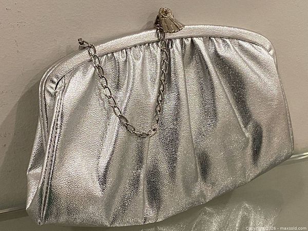 HL USA silver metallic clutch bag | Maxsold