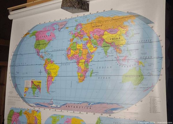 Rand McNally pull-down world map on roller | Maxsold