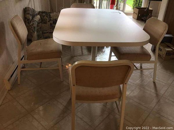 Melamine Table with 4 Metal Frame Chairs | Maxsold