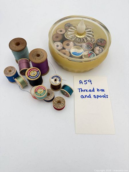 Vintage thread box with wooden spools | Maxsold