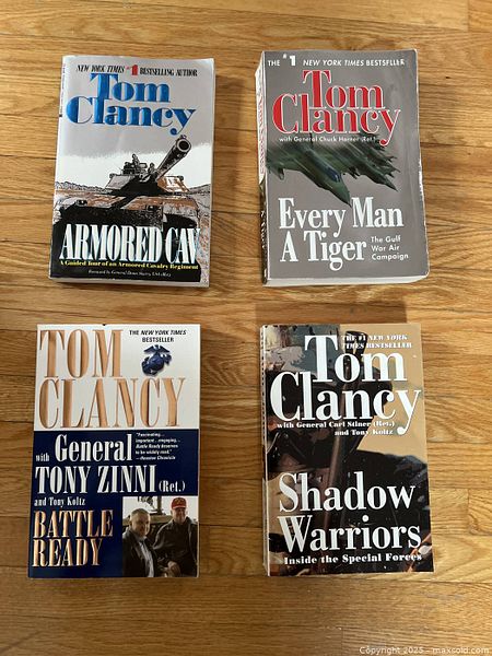 Four Tom Clancy Books on Military Subjects | Maxsold