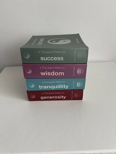 Four A Thousand Paths Inspirational Books | Maxsold