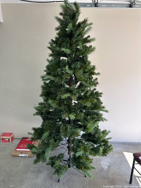 7ft pre-lit artificial Christmas tree | Maxsold