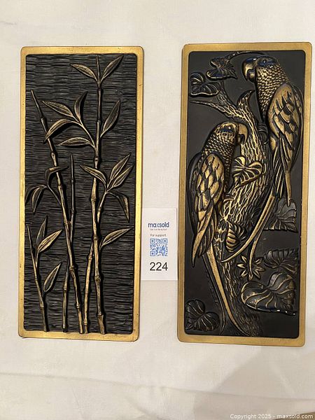 Pair of 7in x 17in moulded plastic wall plaques | Maxsold